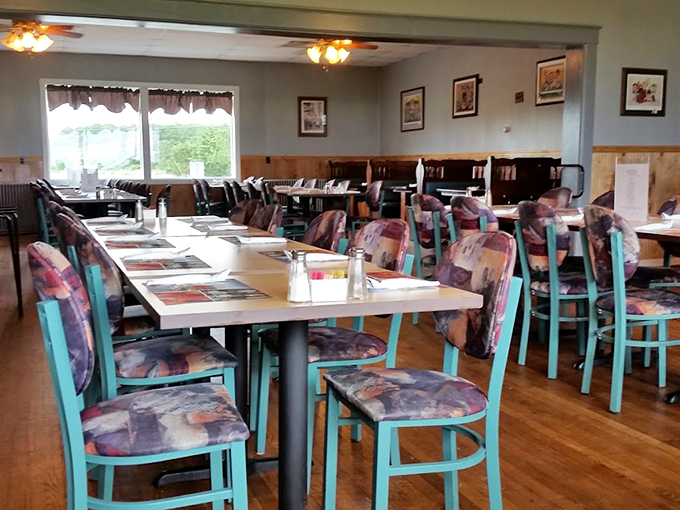 Step inside to a dining room where turquoise chairs pop against wooden accents&mdash;casual comfort that lets the food be the real showstopper.