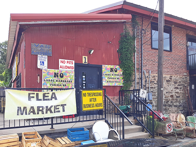 The unassuming red brick exterior might not scream "treasure trove," but like all great adventures, this one begins with a humble doorway and a simple banner.