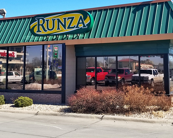 The iconic green roof of Runza beckons like a prairie lighthouse, promising comfort food that's been warming Nebraskan hearts for generations.
