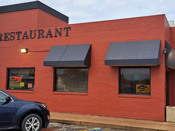 The unassuming brick exterior of Monroe Family Restaurant proves once again that culinary treasures often hide behind the most modest facades.