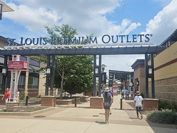 The grand entrance beckons like a retail Promised Land. Blue skies above, bargains within&mdash;Missouri's shopping paradise awaits.