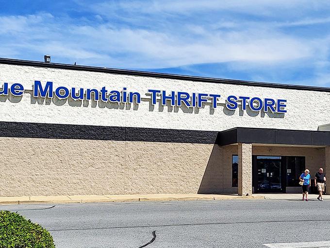 The unassuming exterior of Blue Mountain Thrift Store &ndash; where retail magic happens behind a modest fa&ccedil;ade. Like finding a gourmet restaurant in a gas station, appearances can be delightfully deceiving.