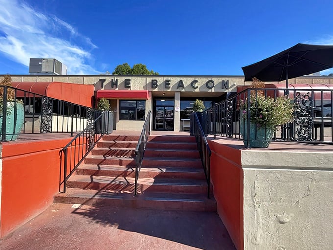 The iconic red awnings and classic signage of The Beacon welcome hungry visitors like an old friend who's been saving your seat since forever.