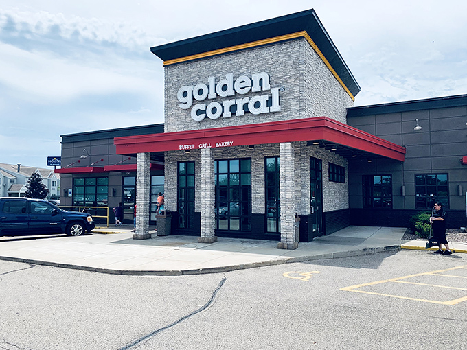 That distinctive Golden Corral entrance beckons like a lighthouse for the professionally hungry, promising all-you-can-eat satisfaction within.