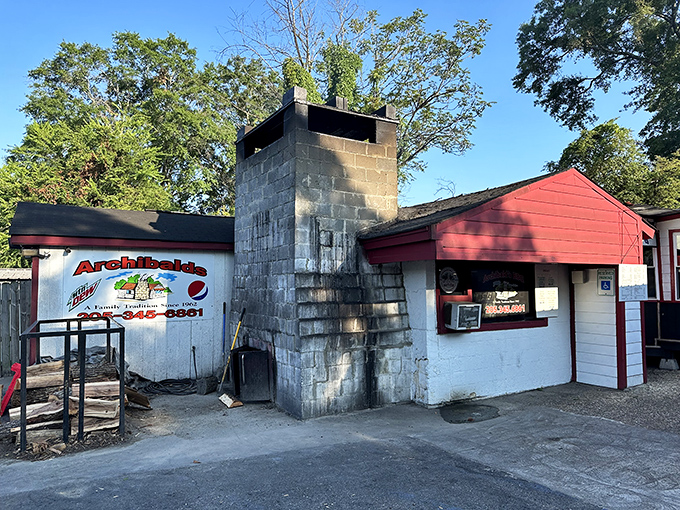 The unassuming cinderblock fortress of flavor that is Archibald's BBQ. That chimney isn't for show&mdash;it's been pumping out smoke signals to hungry Alabamians for decades.