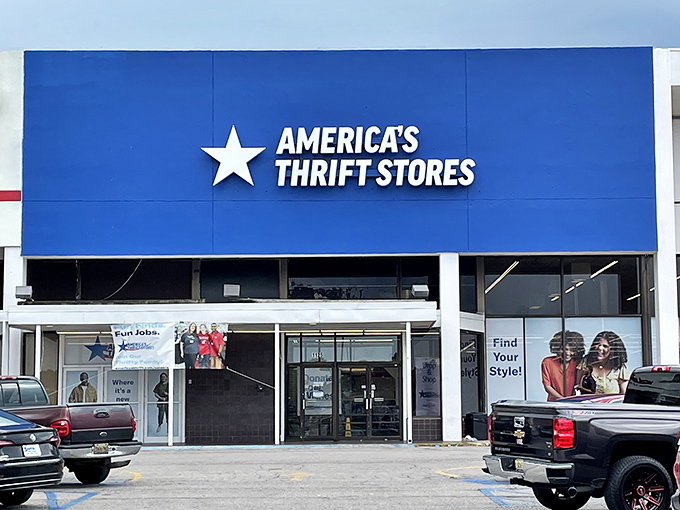 The iconic blue storefront with its white star logo stands like a beacon of bargain possibilities under the Alabama sky.