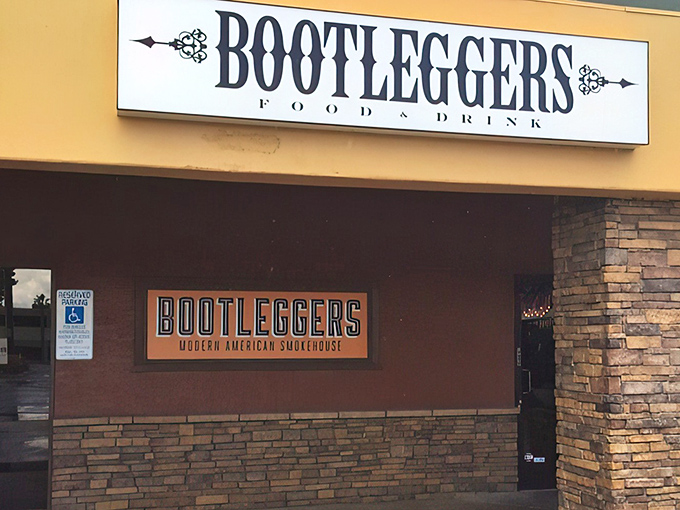 Bootleggers' exterior beckons with understated charm, promising smoky delights within its stone-faced walls. Follow that BBQ aroma!