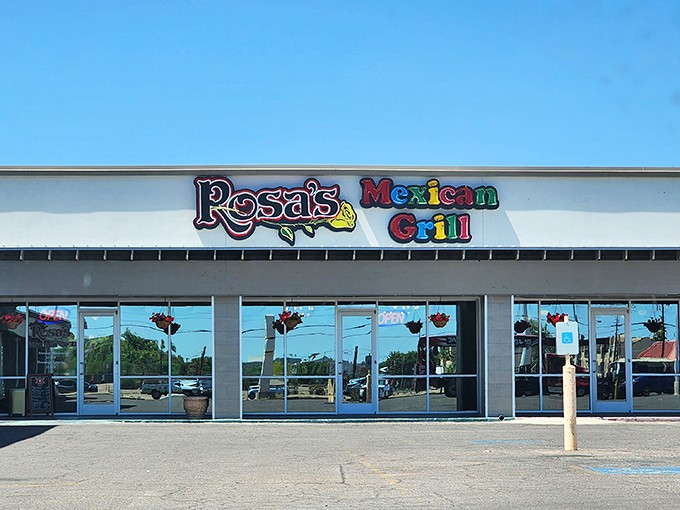 The colorful sign of Rosa's Mexican Grill stands out against the Arizona sky, a beacon for enchilada enthusiasts making their pilgrimage to Mesa.