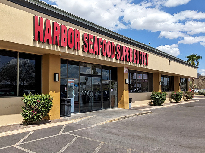 The bold red lettering against the desert-tan building is like a seafood mirage in Phoenix's asphalt ocean. Harbor Seafood Super Buffet beckons with unpretentious promise.