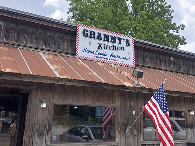 The weathered wood and rusty metal roof aren't trying to impress anyone—they're too busy housing some of Arkansas's most honest cooking.