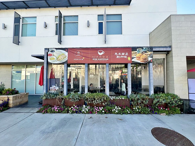 The bright red awning beckons like a culinary lighthouse in Alhambra, with photos of signature dishes that basically constitute edible billboards for your stomach.