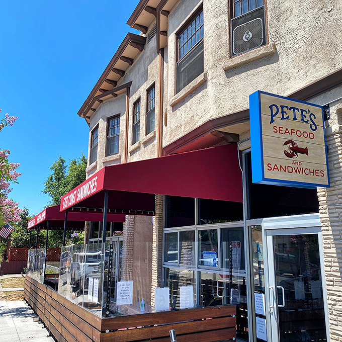 The unassuming storefront with its red awning and wooden patio railing is like a secret handshake among San Diego seafood lovers&mdash;modest exterior, extraordinary flavors within.