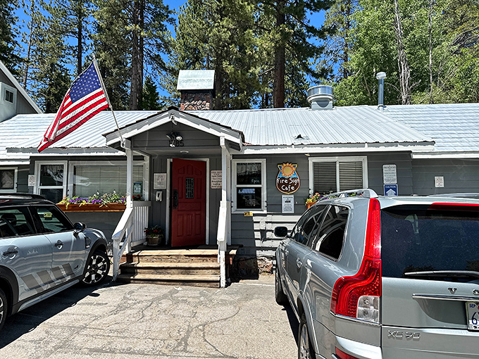 The unassuming exterior of Fire Sign Caf&eacute; stands like a culinary lighthouse among the pines, promising breakfast salvation to hungry Tahoe travelers.