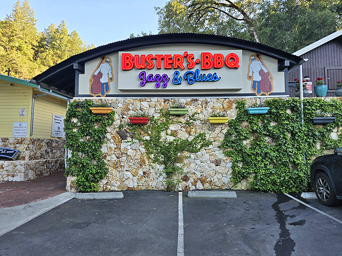 Sunshine illuminates Buster's stone facade, where ivy creeps between colorful planters&mdash;nature's way of giving this BBQ joint its proper frame.