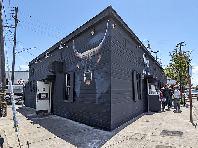 The matte black exterior with that magnificent longhorn mural isn't just a building&mdash;it's a smoke signal to barbecue pilgrims that they've reached the promised land.