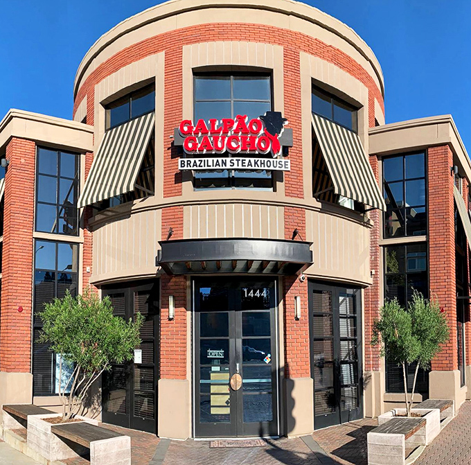 The distinctive curved brick facade of Galp&atilde;o Gaucho stands like a carnivore's lighthouse, beckoning meat lovers to safe harbor in Walnut Creek.