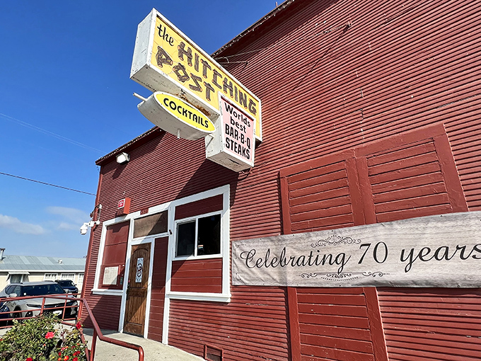 The terracotta-colored exterior of Hitching Post stands like a beacon for meat lovers, promising old-school charm and legendary steaks in the quiet town of Casmalia.