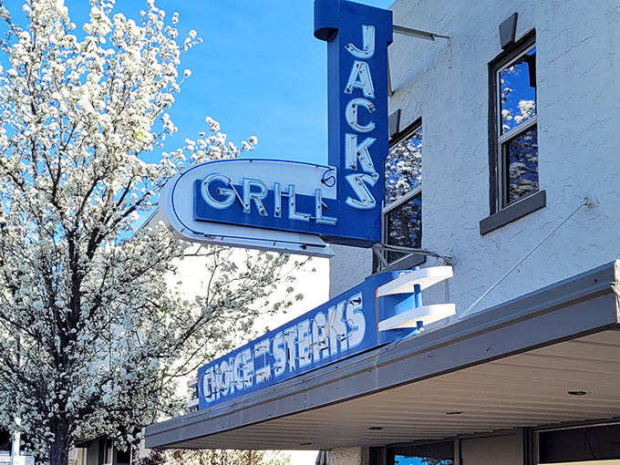 That iconic blue neon sign has been beckoning hungry travelers to Jack's Grill since FDR was president. Some landmarks just get better with age.