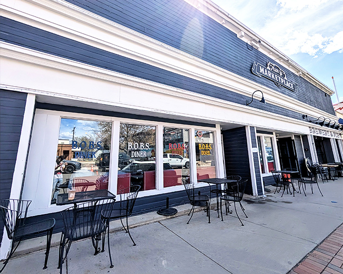 The classic blue exterior of Bob's Diner stands like a beacon of breakfast hope on Louisville's Main Street, promising pancake perfection behind those welcoming windows.