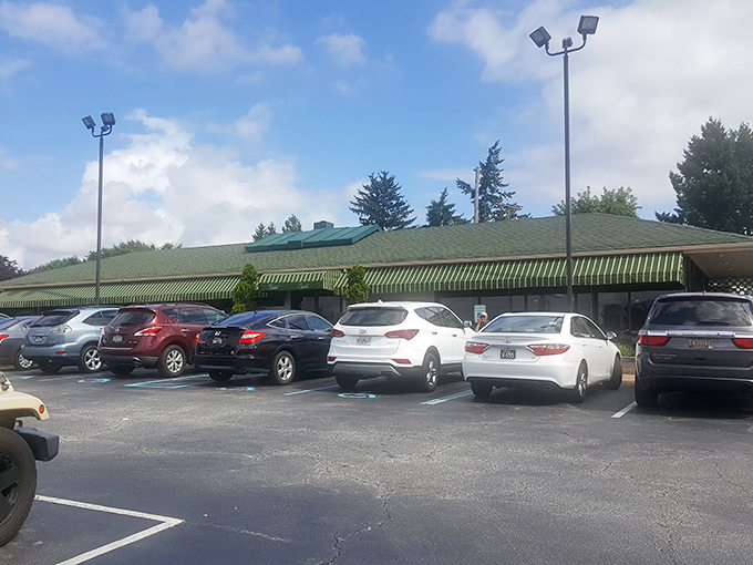 The green awnings of Crossroads Restaurant stand like beacons of comfort food hope against the Delaware sky. A full parking lot never lies.