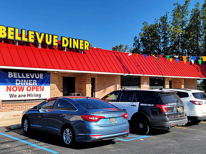 The iconic red roof and bright yellow signage of Bellevue Diner stands as a beacon for breakfast lovers across Delaware. Morning pilgrimage, anyone?