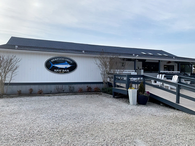 Bluecoast's charming white exterior stands like a beacon for seafood lovers, promising coastal delights in a relaxed setting.