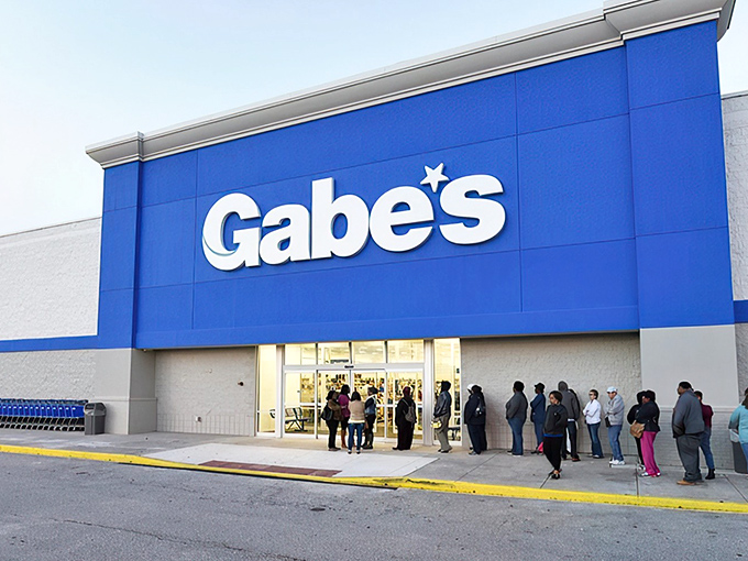 The iconic blue facade of Gabe's in Bear stands like a retail lighthouse, beckoning bargain hunters from across Delaware with promises of treasures within.