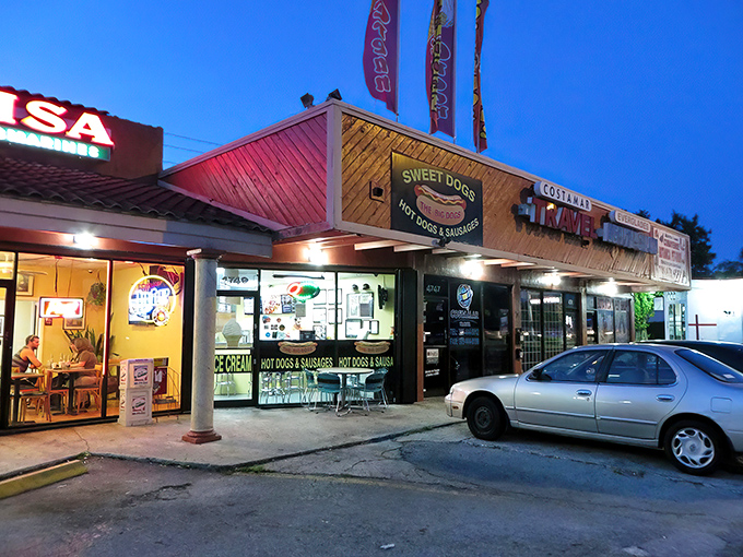 The unassuming storefront of Sweet Dogs glows like a beacon for hot dog aficionados, proving that culinary treasures often hide in plain sight.