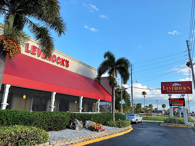 The iconic red awning of Leverock's stands out against the Florida sky like a beacon calling to hungry seafood lovers everywhere.