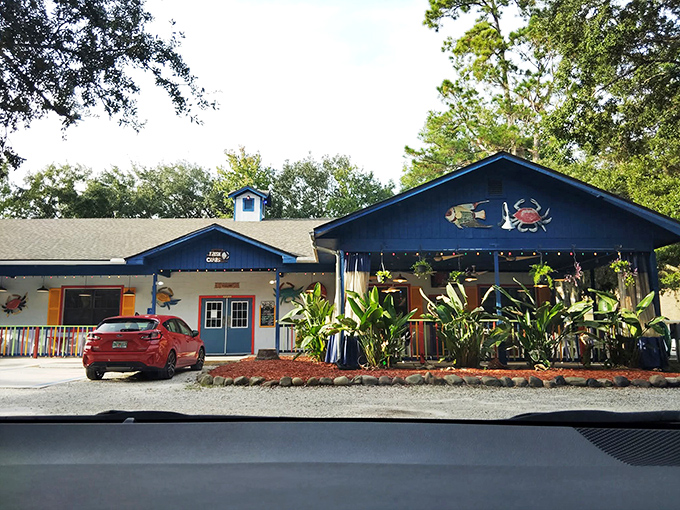 The blue facade isn't just a name&mdash;it's a promise. This unassuming Jacksonville treasure stands ready to transform your seafood expectations under the watchful gaze of a Florida palm.