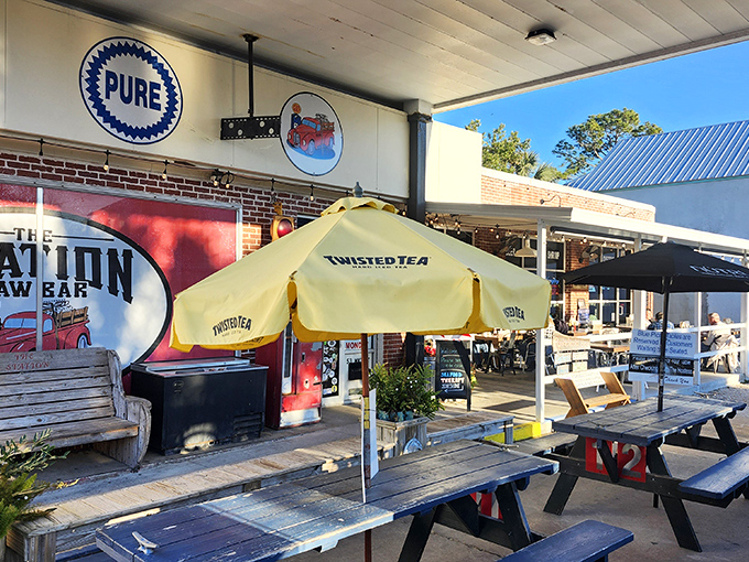 The ultimate Florida plot twist: a former gas station now pumping out seafood instead of fuel. The yellow umbrella practically screams "vacation mode activated!"