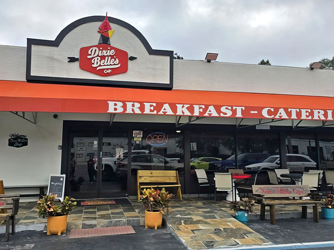 The bright orange awning of Dixie Belle's Cafe stands out like a beacon of breakfast hope in Orlando, promising comfort food that'll make your taste buds dance.