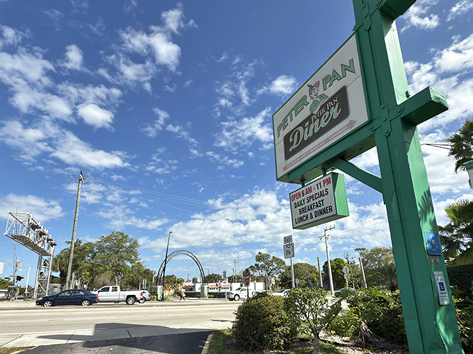 The iconic mint-green sign beckons hungry travelers like a lighthouse for breakfast enthusiasts. Some people chase dreams; others chase perfectly cooked eggs.