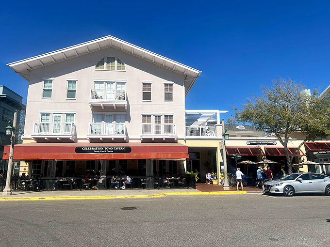That red awning beckons like a lighthouse guiding seafood-starved souls to salvation in the heart of Disney's planned paradise.