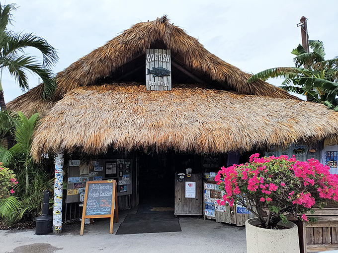 The thatched-roof entrance says it all: abandon your fancy expectations, keep your appetite, and prepare for Florida Keys authenticity at its finest.