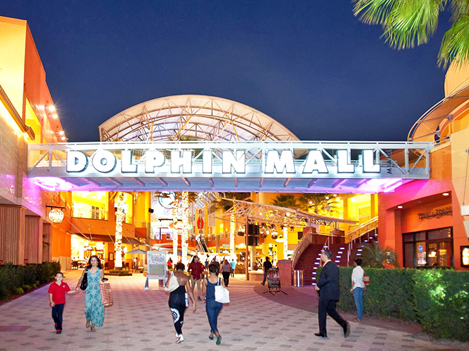 The glowing entrance of Dolphin Mall sets the stage for a lively shopping experience, blending bold architecture with Miami’s vibrant energy.