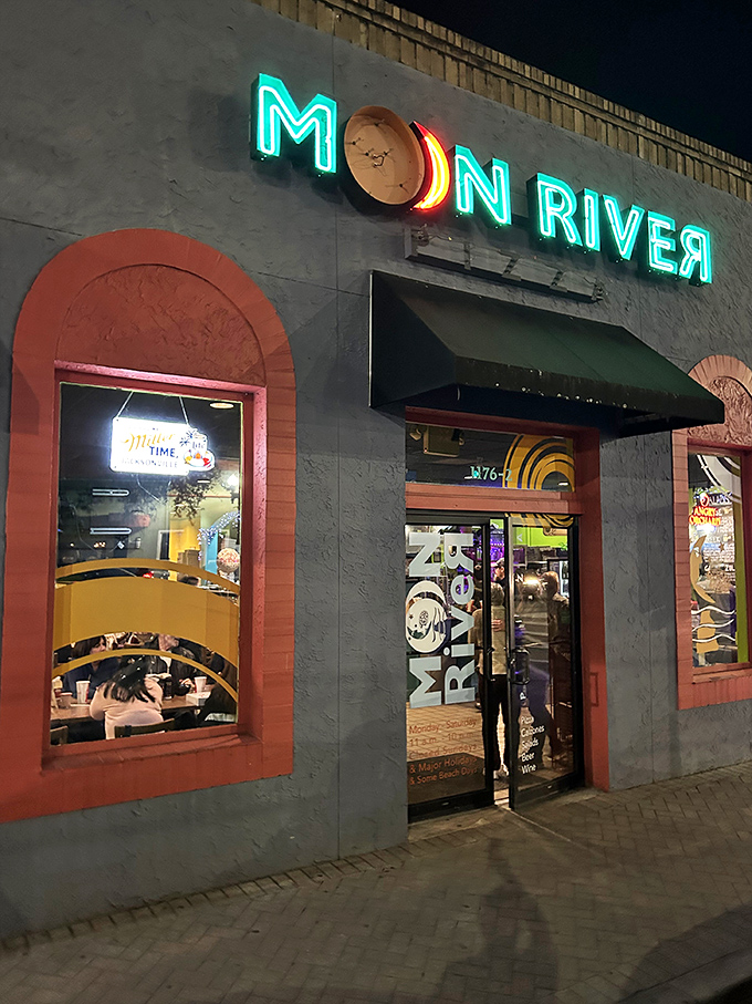 The neon glow of Moon River Pizza beckons like a lighthouse for the hungry, promising salvation from mediocre meals in Jacksonville's evening landscape.