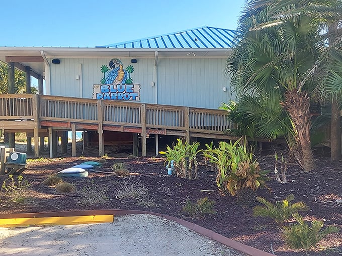 Island architecture at its most authentic&mdash;stilts, weathered wood, and that signature blue roof promising seafood treasures within.