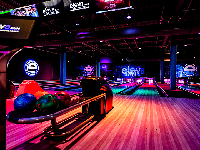 The bowling lanes at Elev8 Fun glow with such vibrant neon colors, you'll feel like you're scoring strikes in a sci-fi movie from the future.