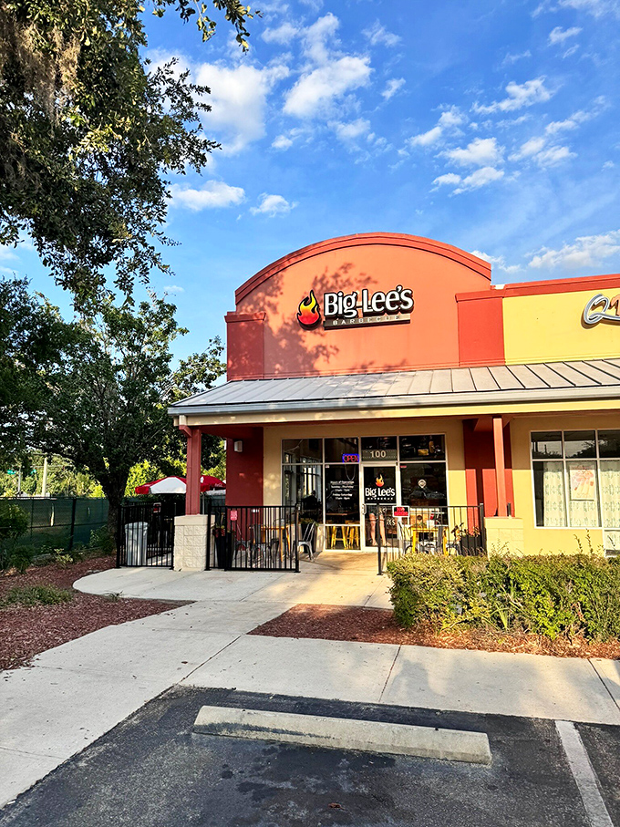 The terra cotta facade of Big Lee's beckons like a barbecue lighthouse, promising smoky salvation to those wise enough to follow their noses to Ocala.