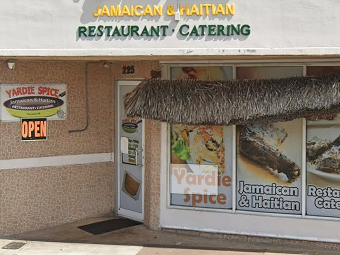 That thatched awning and colorful signage prove you don't need fancy to serve phenomenal Caribbean cuisine.