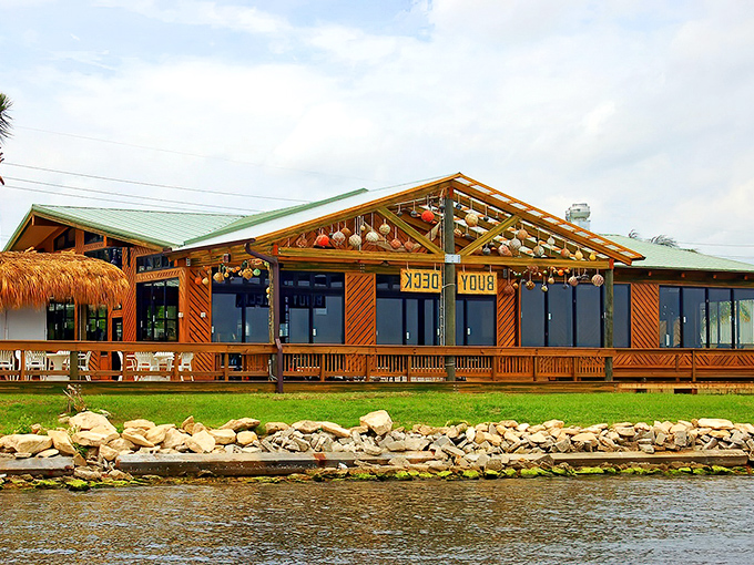 Grills Riverside's thatched-roof tiki paradise sits perfectly perched along the Indian River Lagoon, where seafood dreams meet waterfront reality.