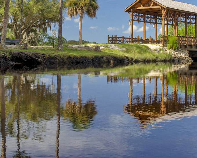 The perfect marriage of rustic charm and Florida wilderness, this covered bridge creates postcard-worthy reflections in the still waters below.