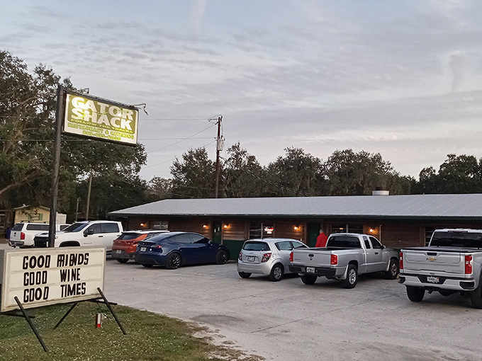 The Gator Shack's illuminated sign promises "Good Minds, Good Wine, Good Times" &ndash; a Florida trifecta that's hard to resist.