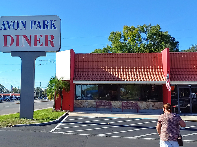 The red-roofed beacon of breakfast hope stands proudly against the Florida sky, promising morning salvation one omelet at a time.