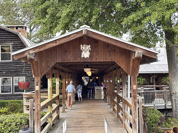 The wooden bridge to barbecue paradise beckons like a time machine to simpler days when smoke signals meant dinner was ready.