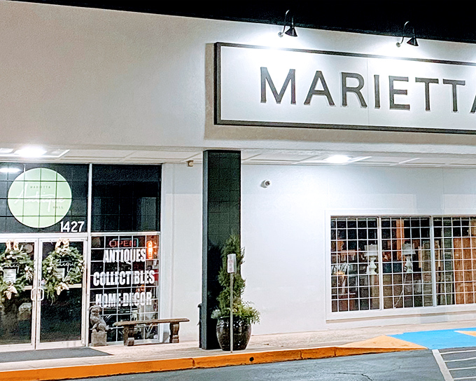 By night, the illuminated sign beckons vintage hunters like a lighthouse for those adrift in a sea of mass-produced sameness.