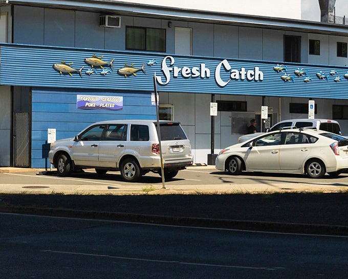 The unassuming blue exterior of Fresh Catch might not scream "culinary destination," but locals know this modest storefront houses some of Hawaii's most satisfying seafood treasures.