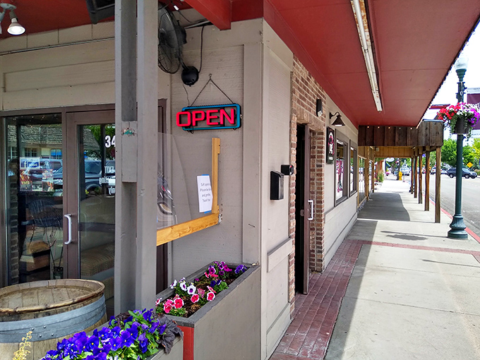 The unassuming storefront with its cheerful flower boxes is like that quiet friend who suddenly reveals they're a concert pianist. Prepare to be amazed.