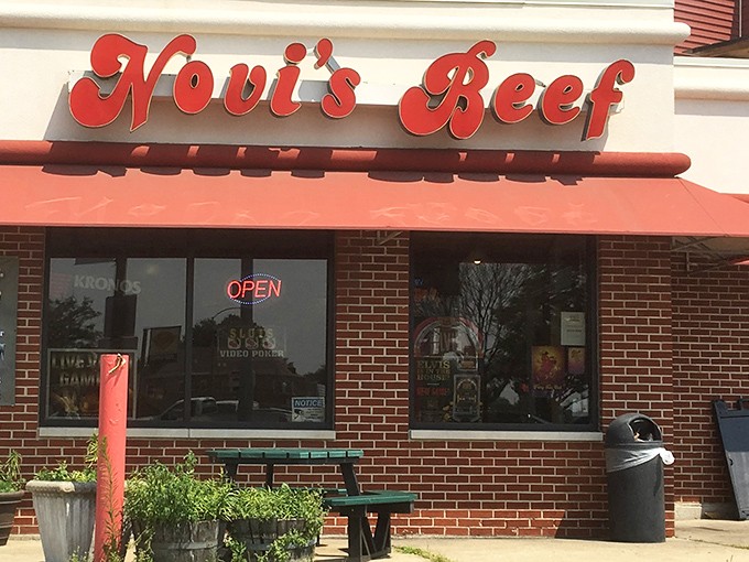 The iconic red script of Novi's Beef against brick and mortar &ndash; a beacon of hope for the hungry souls of Berwyn.